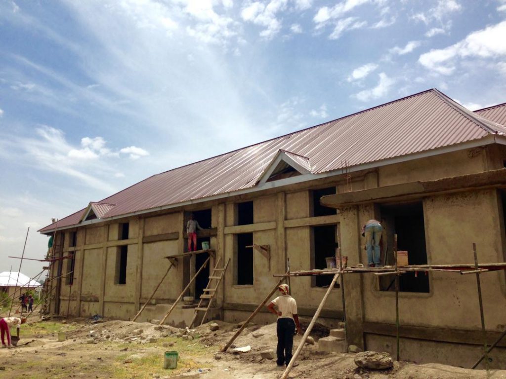 Community Center finishing continues, along with washroom tiling ...